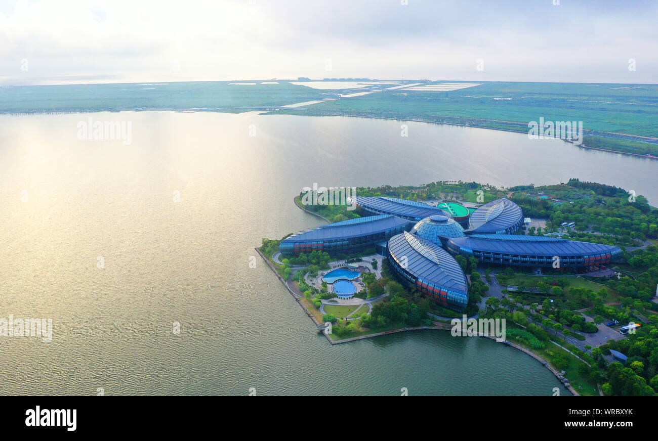 An aerial view of the flower-shaped Crowne Plaza Shanghai Harbour City ...