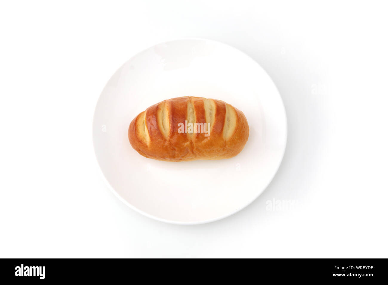 butter bread roll closeup isolated on white background Stock Photo - Alamy