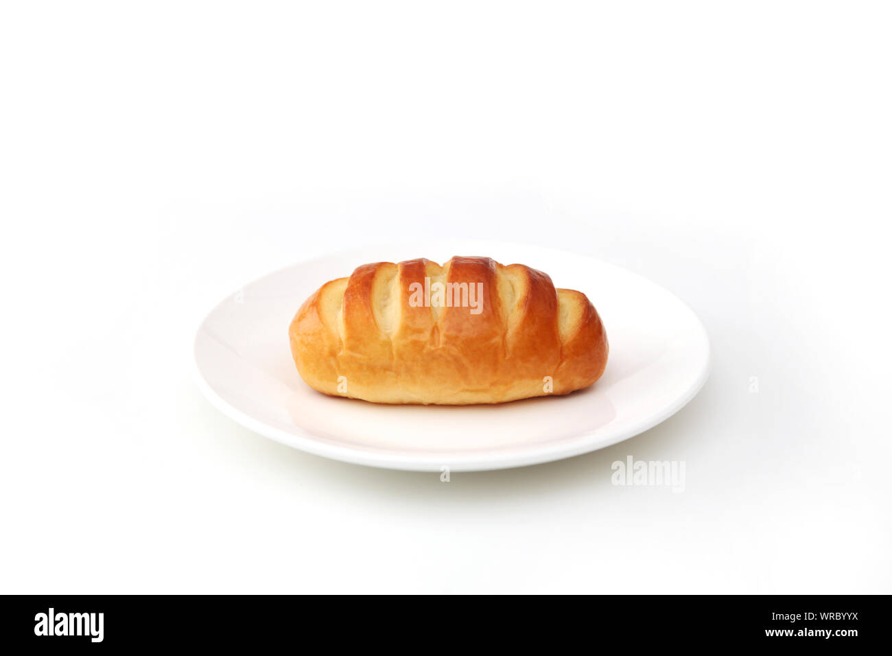 butter bread roll closeup isolated on white background Stock Photo - Alamy