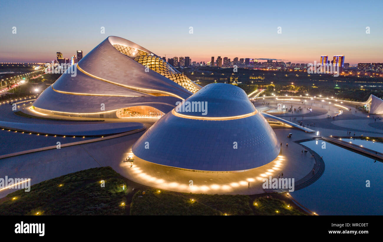 A view at night of Harbin Opera House or Harbin Grand Theater in Harbin ...