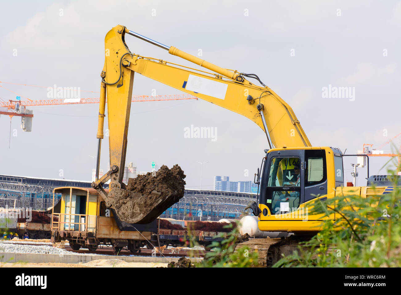 Bulldozer is working in the construction field Stock Photo - Alamy
