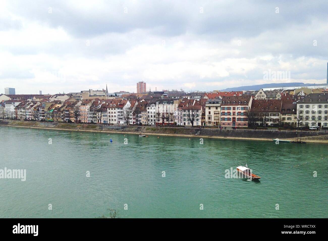 Buildings In Distance With Waterfront Stock Photo - Alamy