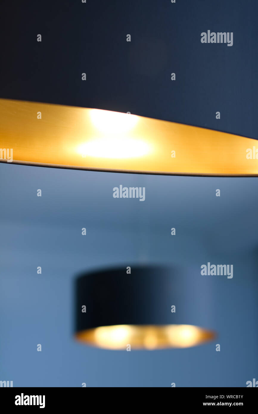 Interior design, indoor lamps and electricity concept - Golden lamp in ...