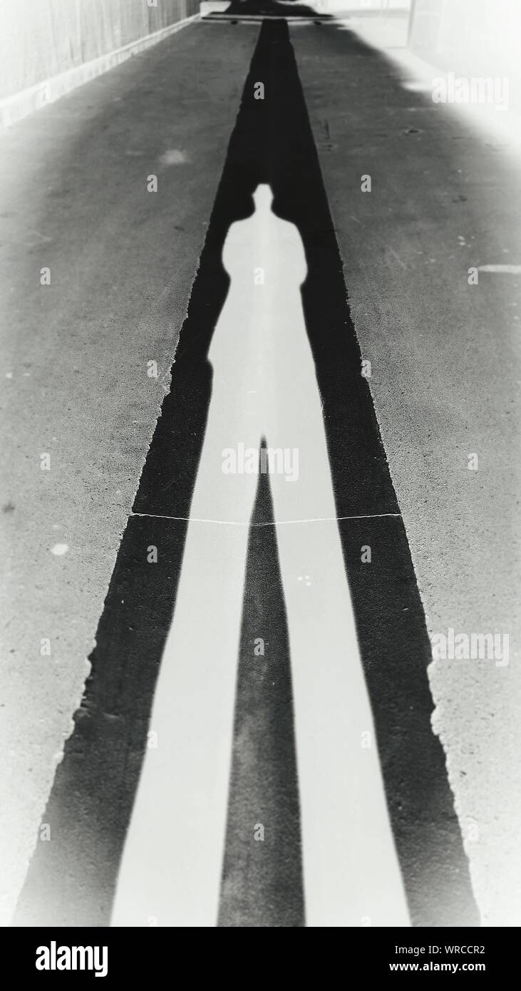 Man and shadow and ground hi-res stock photography and images - Alamy