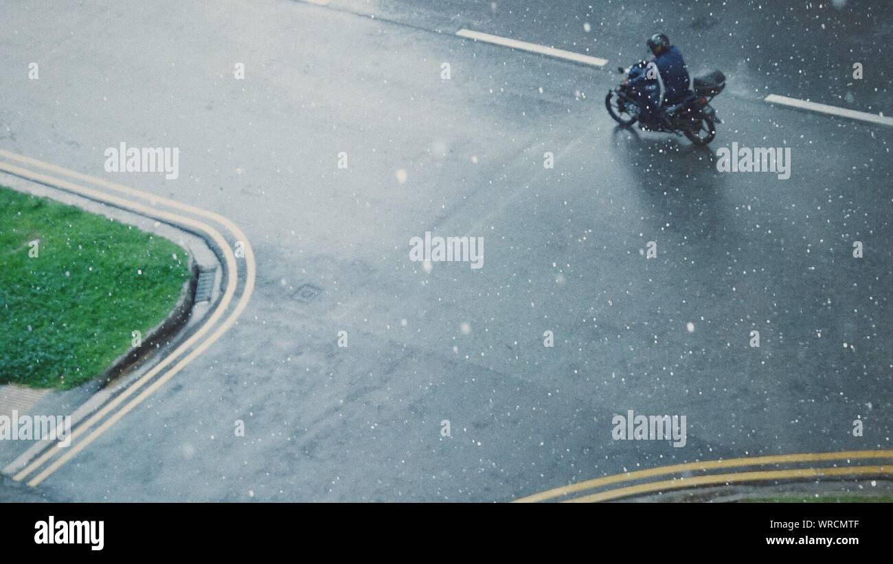 Motorcycle In Rain High Resolution Stock Photography and Images - Alamy