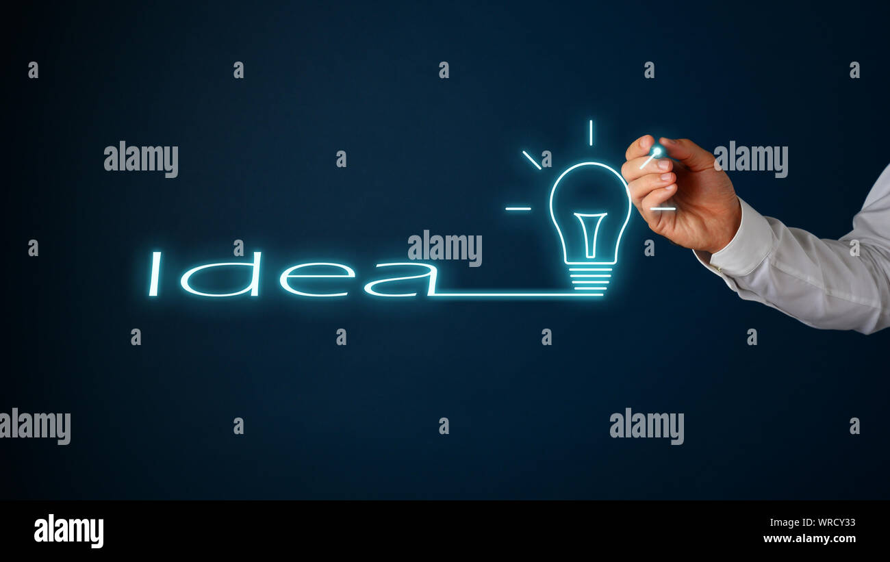 Word Idea continuing in to a light bulb drawn on digital interface over ...