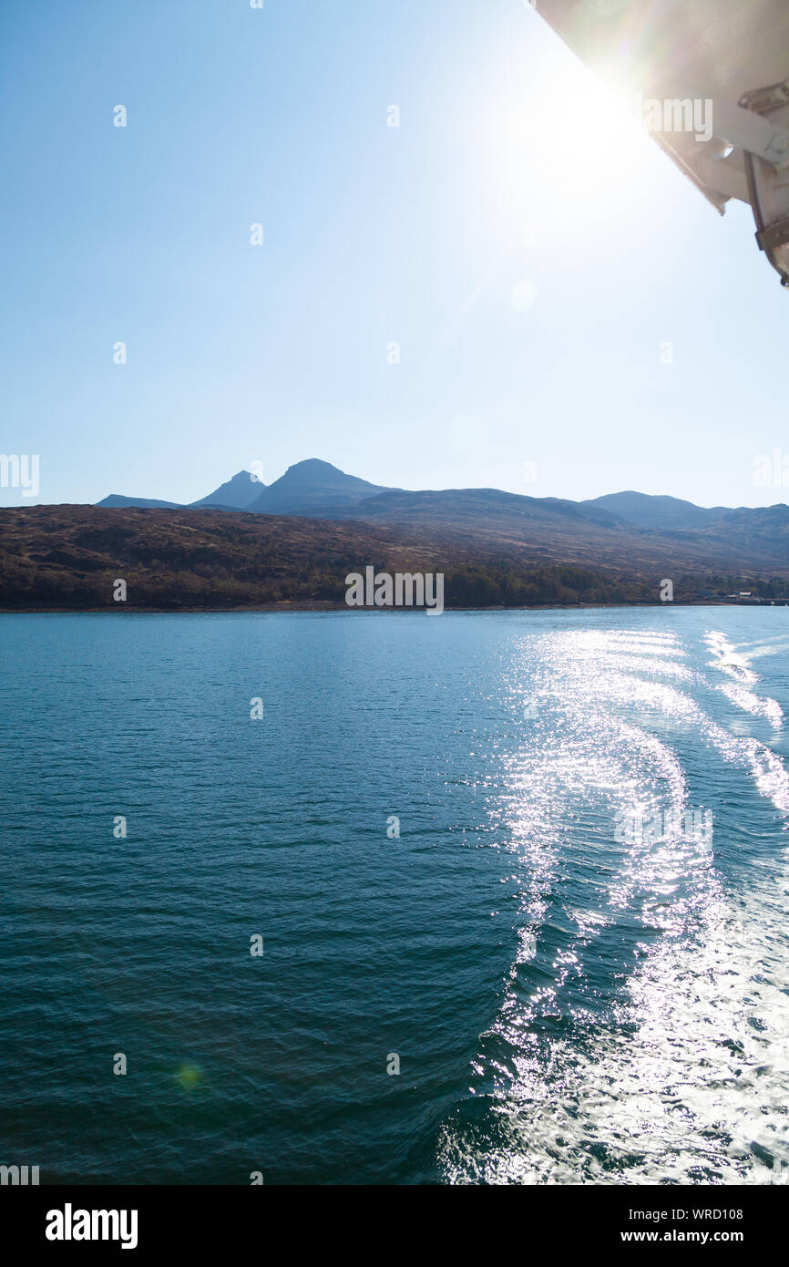 The isle of Rum seen from a calmac ferry Stock Photo - Alamy