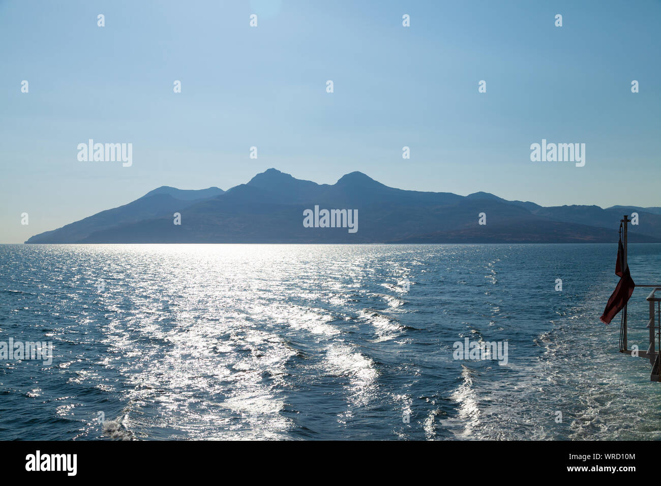 The isle of Rum seen from a calmac ferry Stock Photo - Alamy
