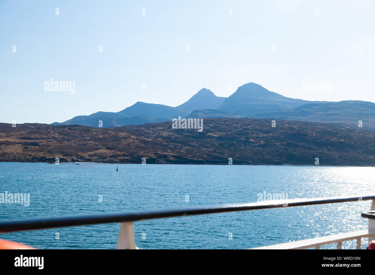 The isle of Rum seen from a calmac ferry Stock Photo - Alamy