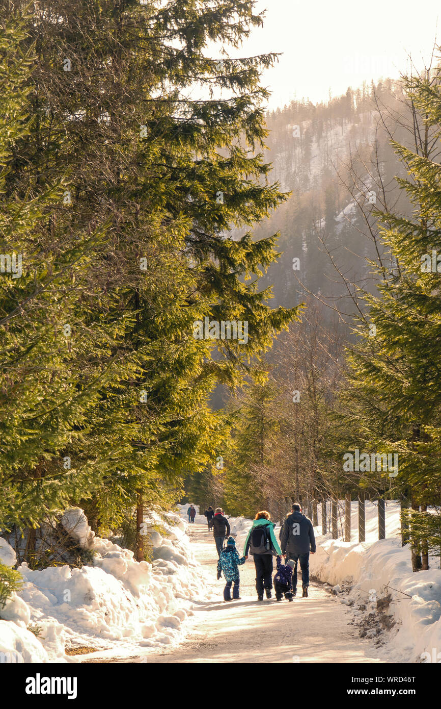 Mother father walk through snow hi-res stock photography and images - Alamy