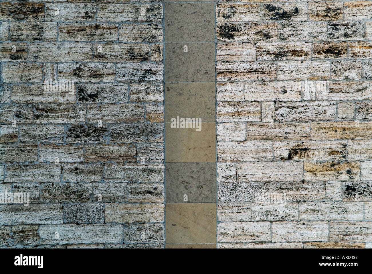 Plain stone wall devided by bricks Stock Photo - Alamy