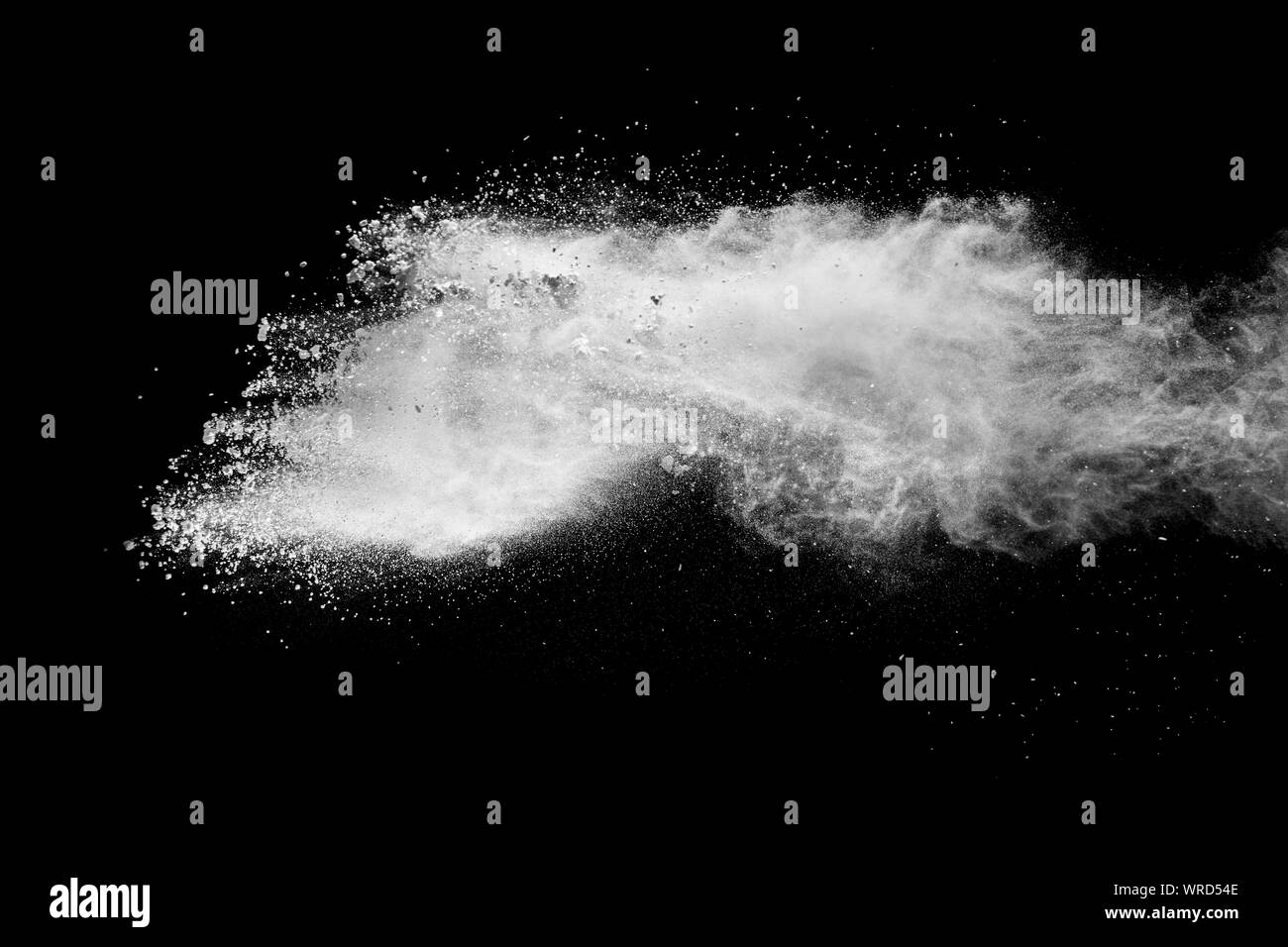 White powder explosion clouds.Freeze motion of white dust particles on ...
