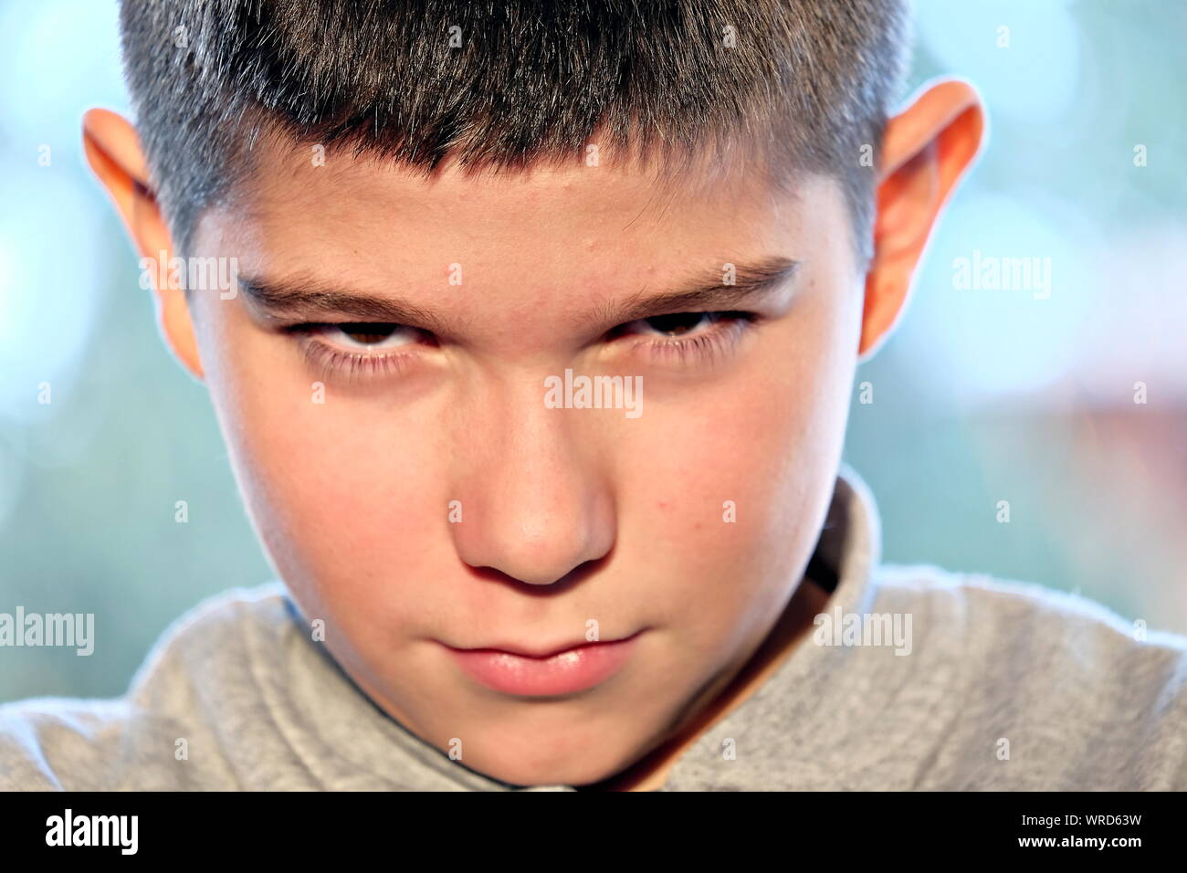 Portrait of sulky boy Stock Photo - Alamy