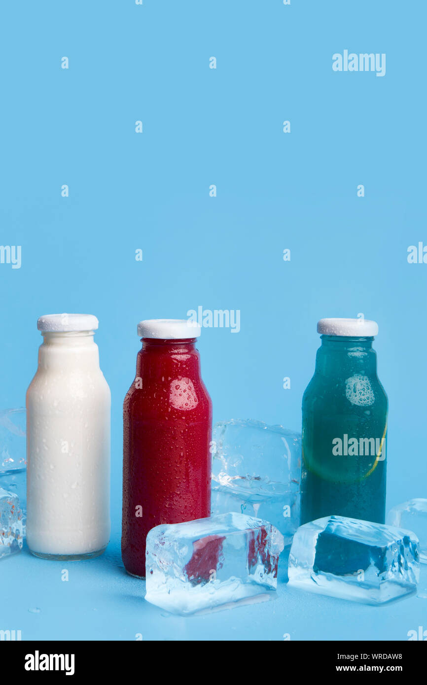 Close up of three different types detox drinks on blue Stock Photo - Alamy
