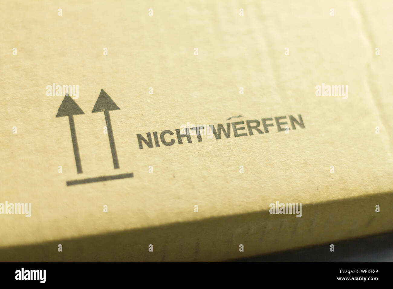 Cardboard box with warning "do not throw" cardboard cardboard cardboard ...