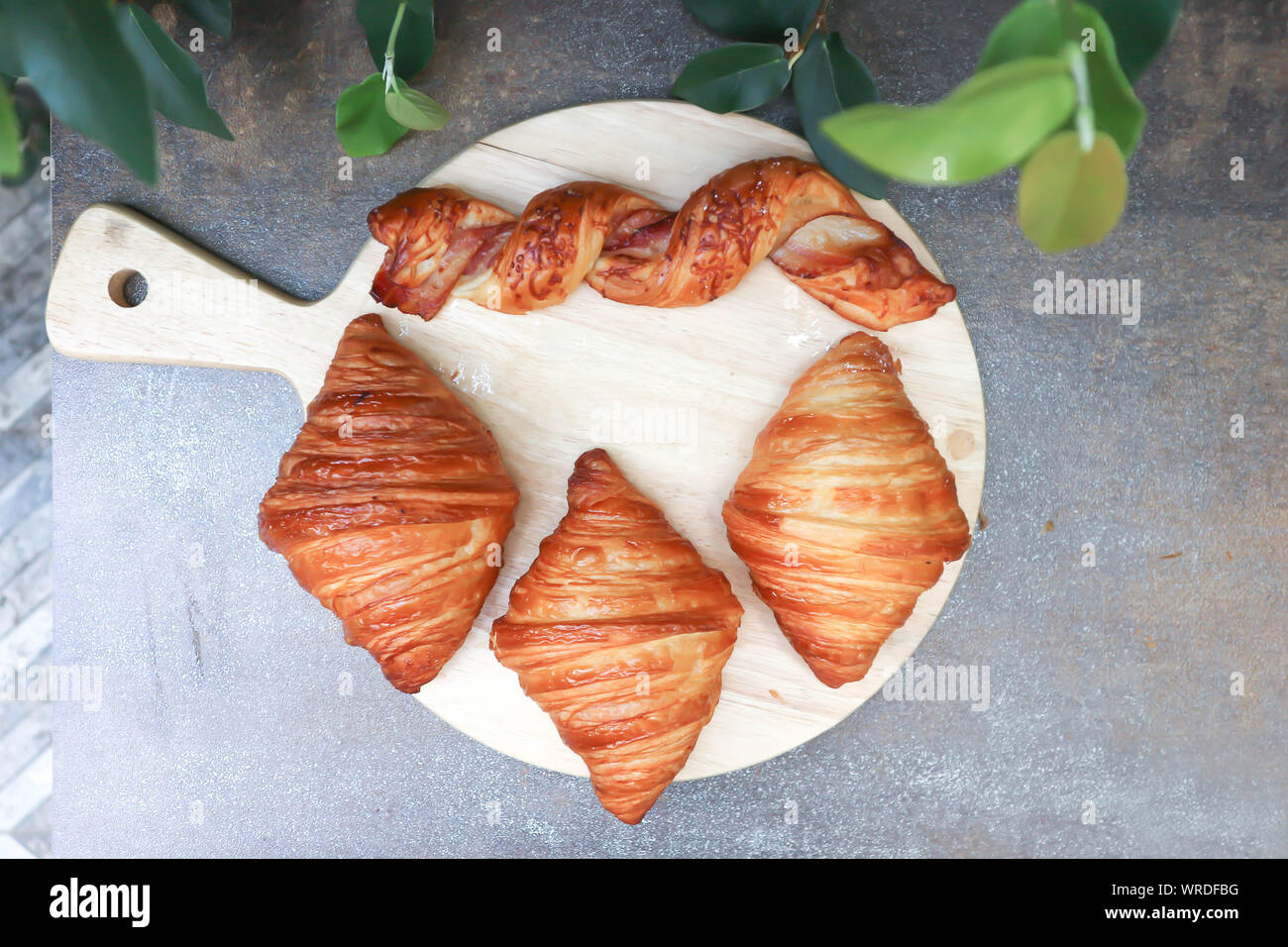 croissant and Bacon Twist Bread sticks in the tray Stock Photo - Alamy