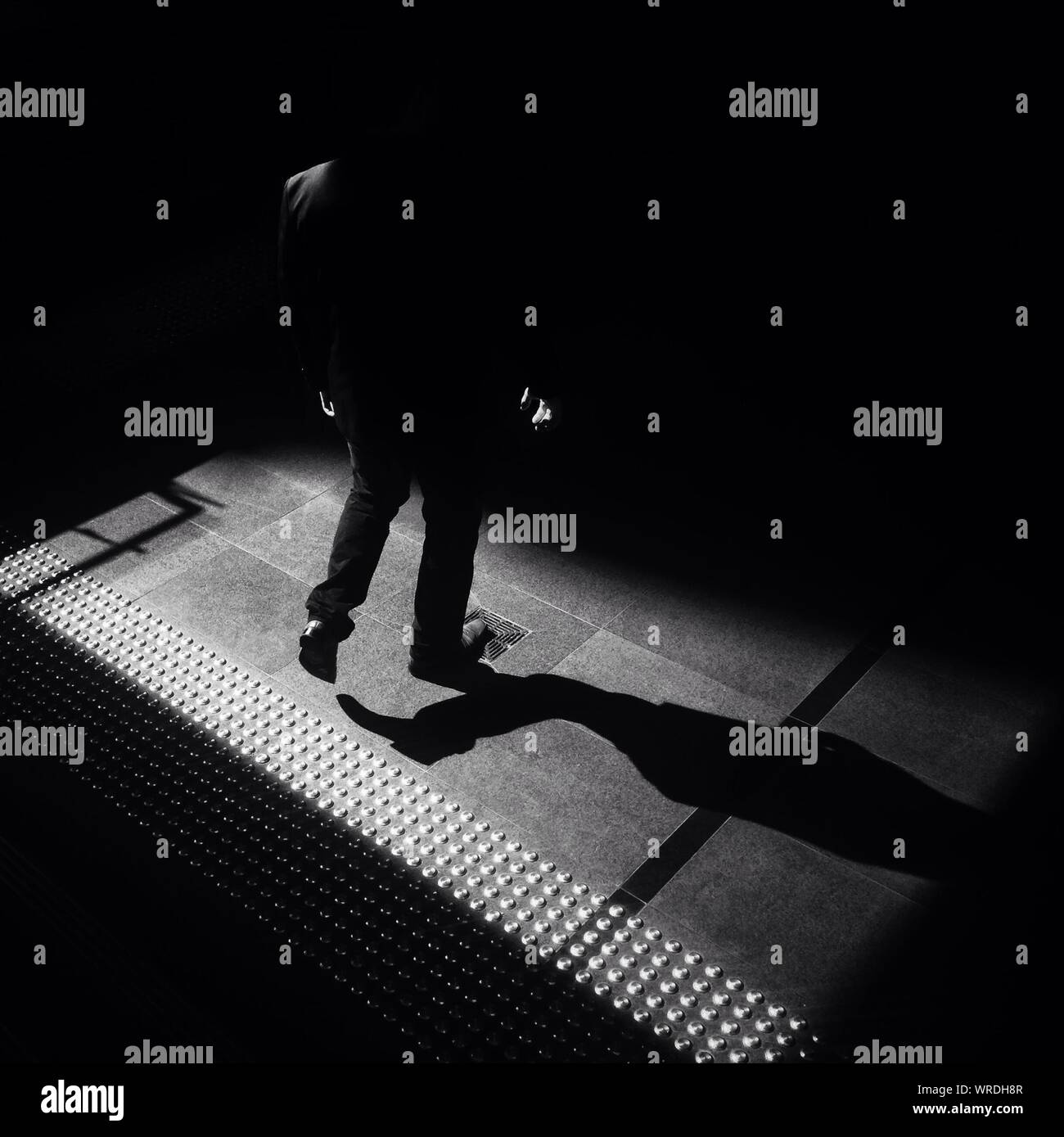 Man Silhouette Walking Shadow High Resolution Stock Photography and ...