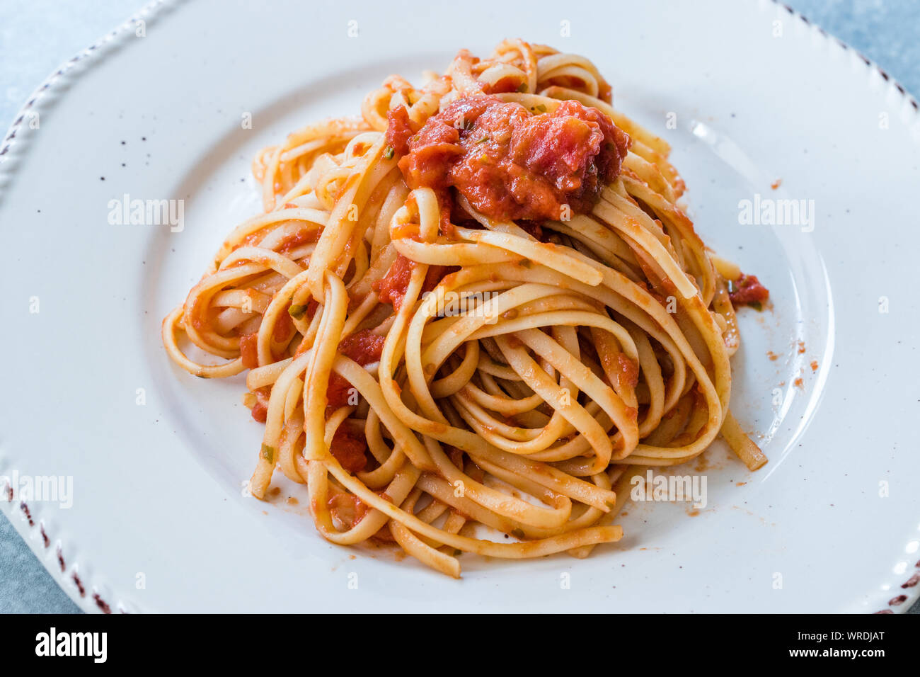 Heaped Plate of Classic Italian Pasta Spaghetti with Basil and Tomato ...