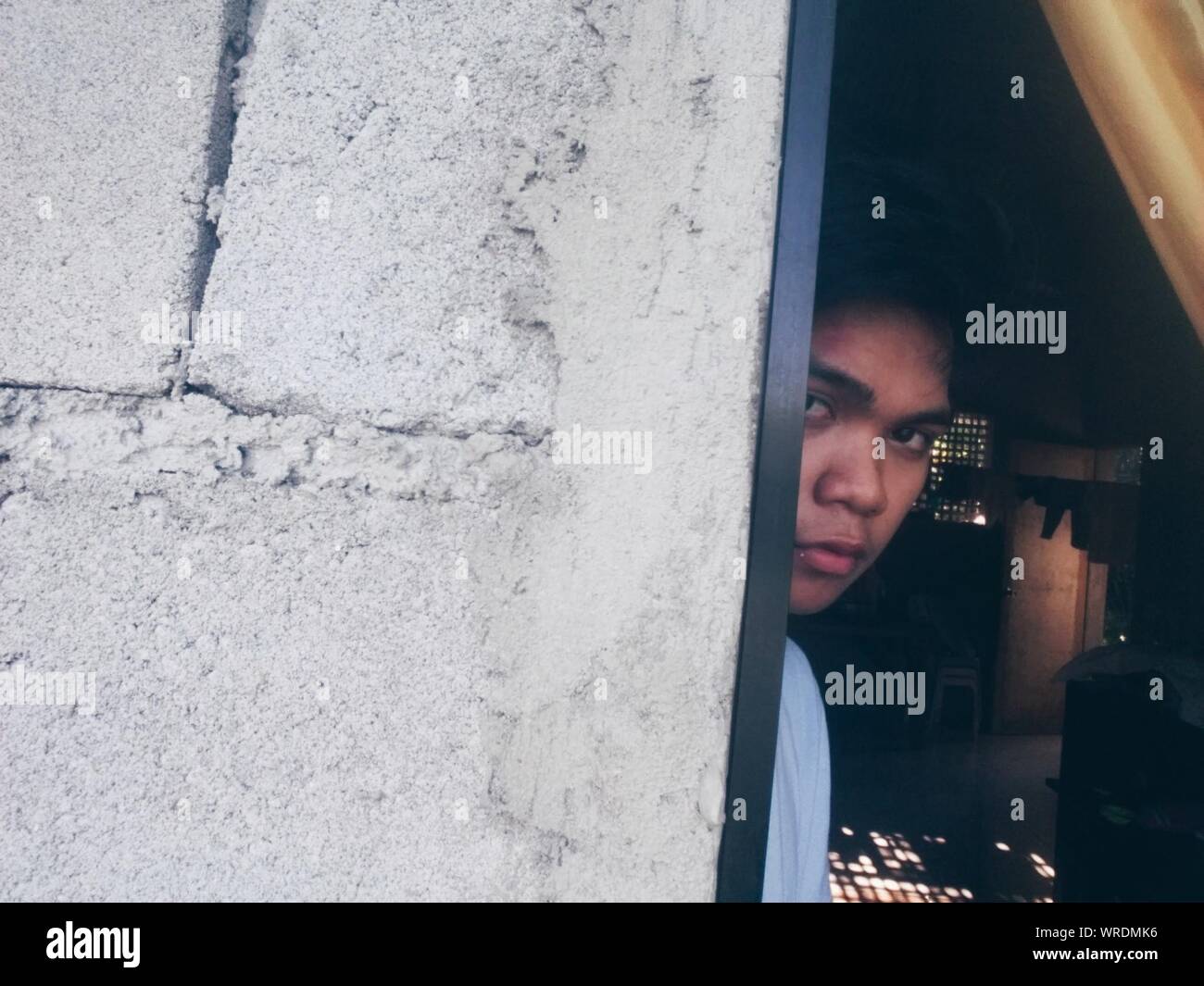 Man at the wall hi-res stock photography and images - Alamy