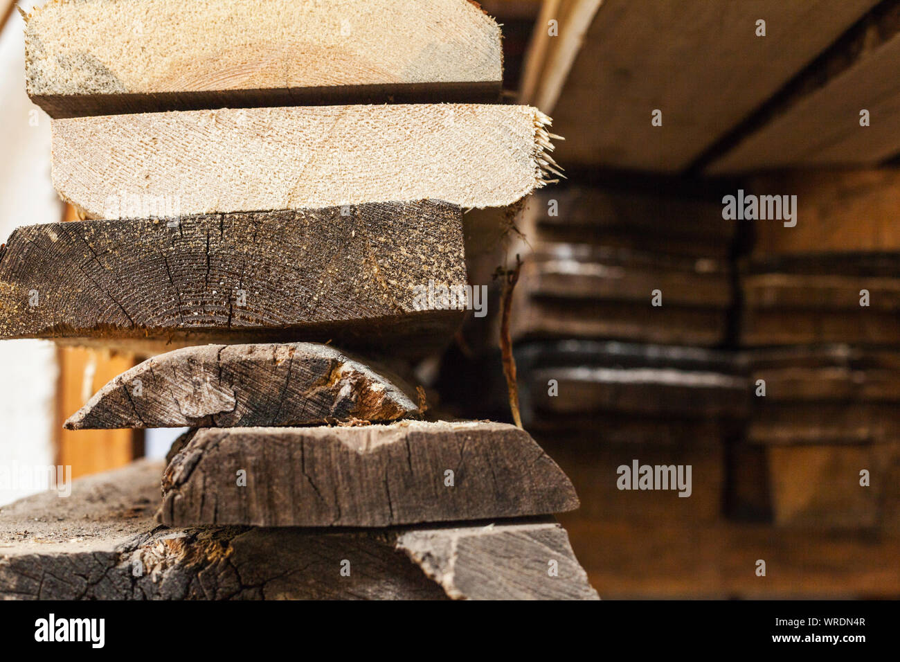 Stack of wood with wooden boards for further processing in wood ...