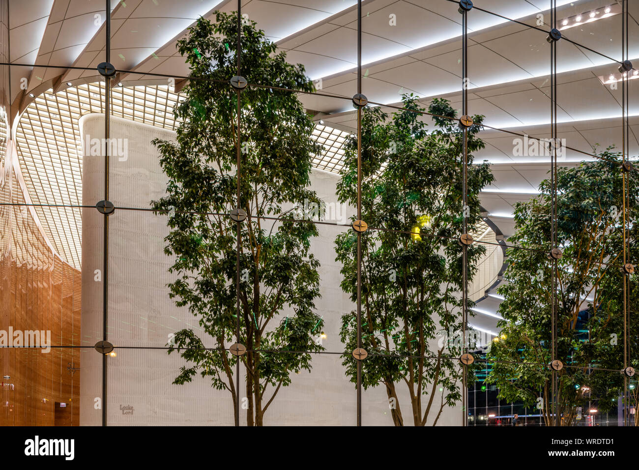 Lobby of the Deloitte building at night Stock Photo - Alamy