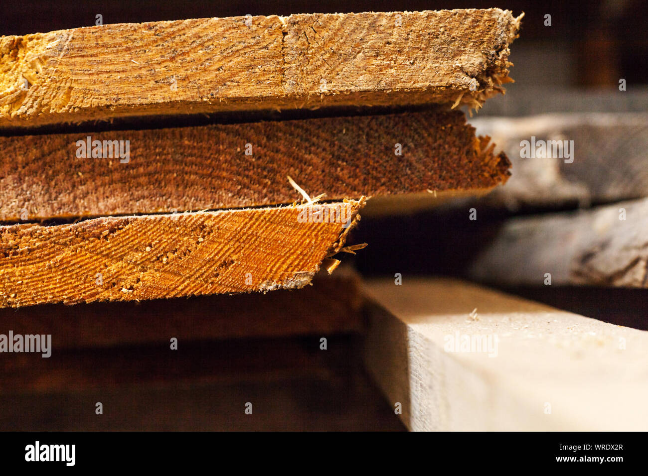 Stack of wood with wooden boards for further processing in wood ...