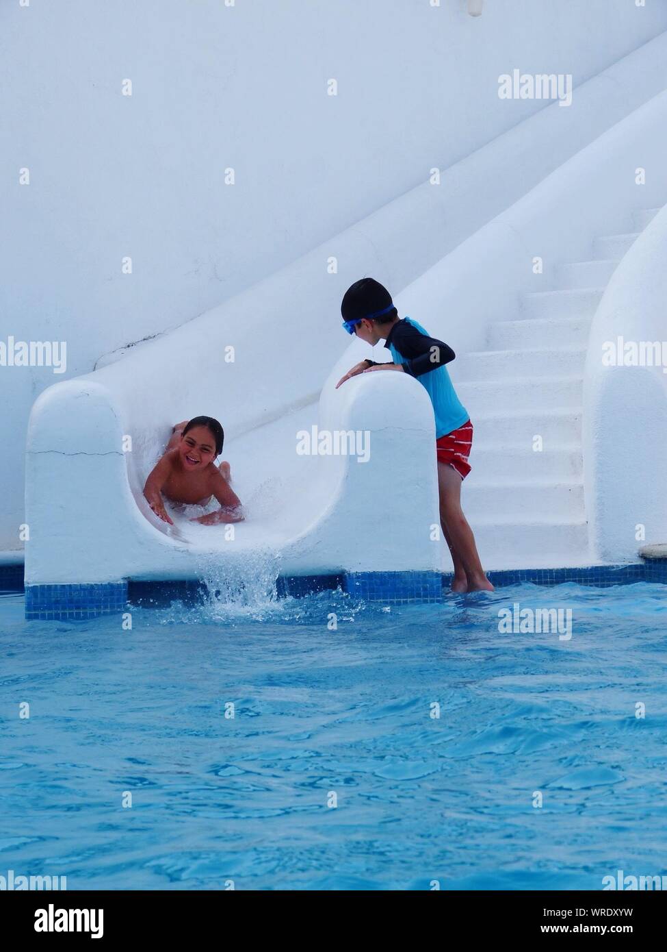 Girl water slide hi-res stock photography and images - Alamy