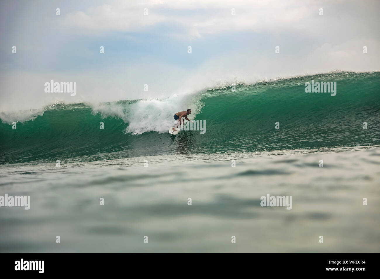 Balancing on wave hi-res stock photography and images - Alamy