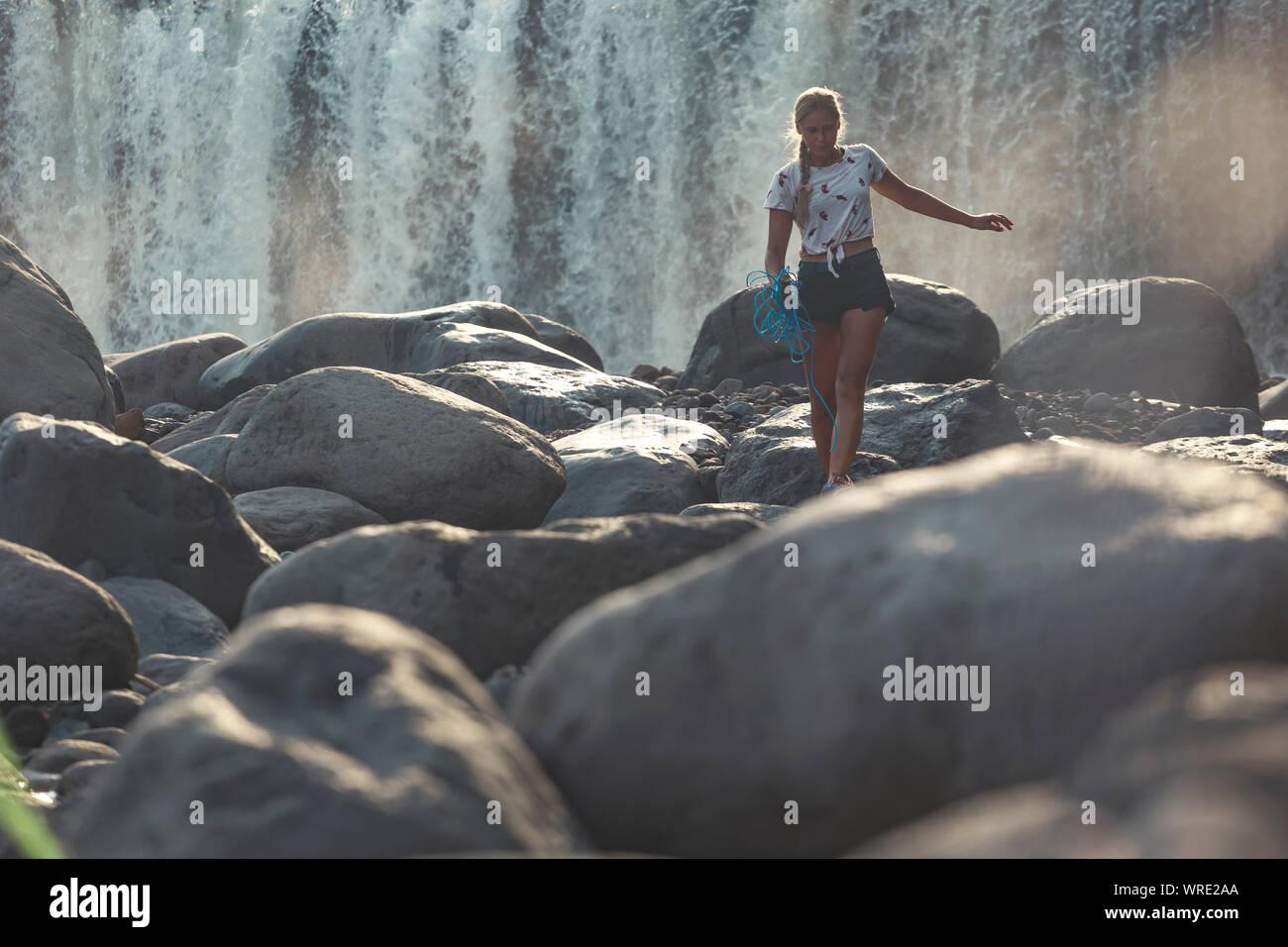 Person sitting by water feature hi-res stock photography and images - Alamy