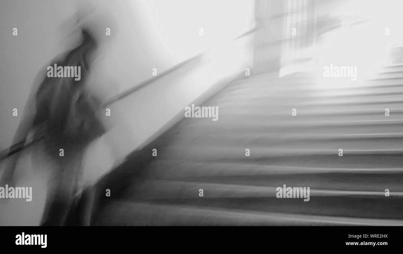 Person blurred walking by wall hi-res stock photography and images - Alamy