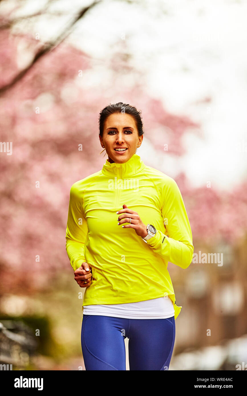 Woman running spring hi-res stock photography and images - Alamy