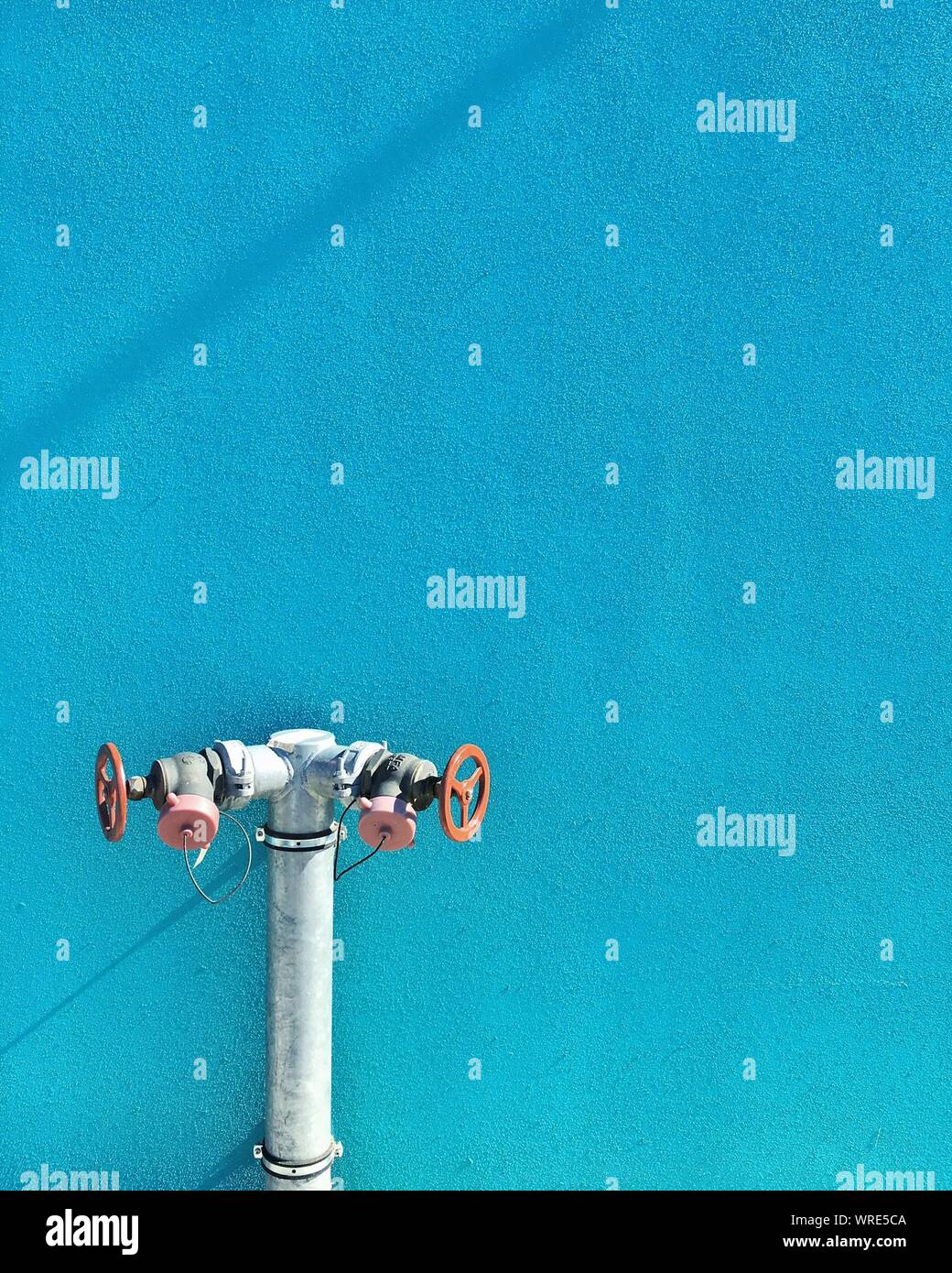 Fire Hydrant On Wall High Resolution Stock Photography and Images - Alamy