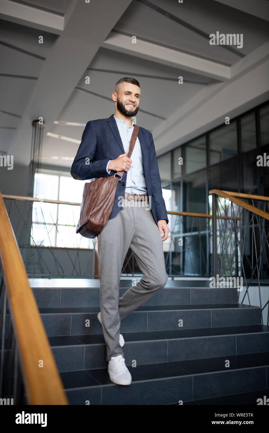 Office worker feeling excited having first working day in the office ...