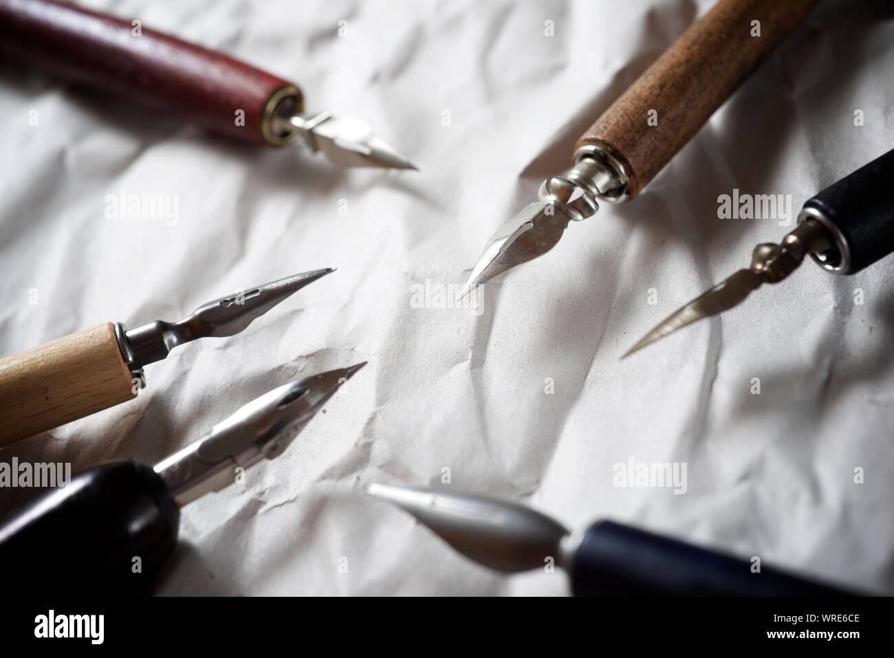 Nib pens on a white paper Stock Photo - Alamy