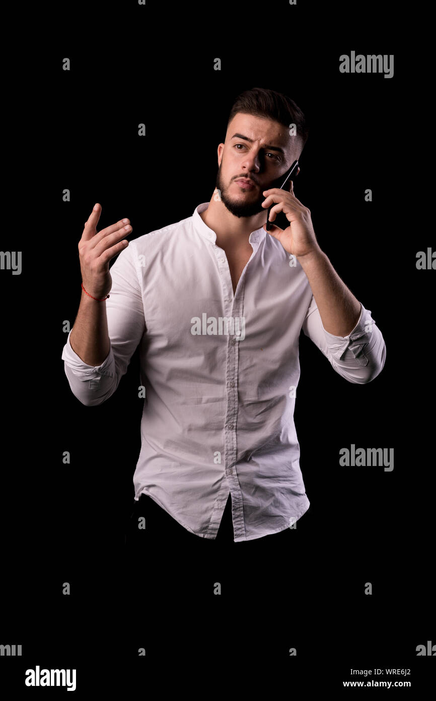 Business man making a phone call with smartphone. An important call ...
