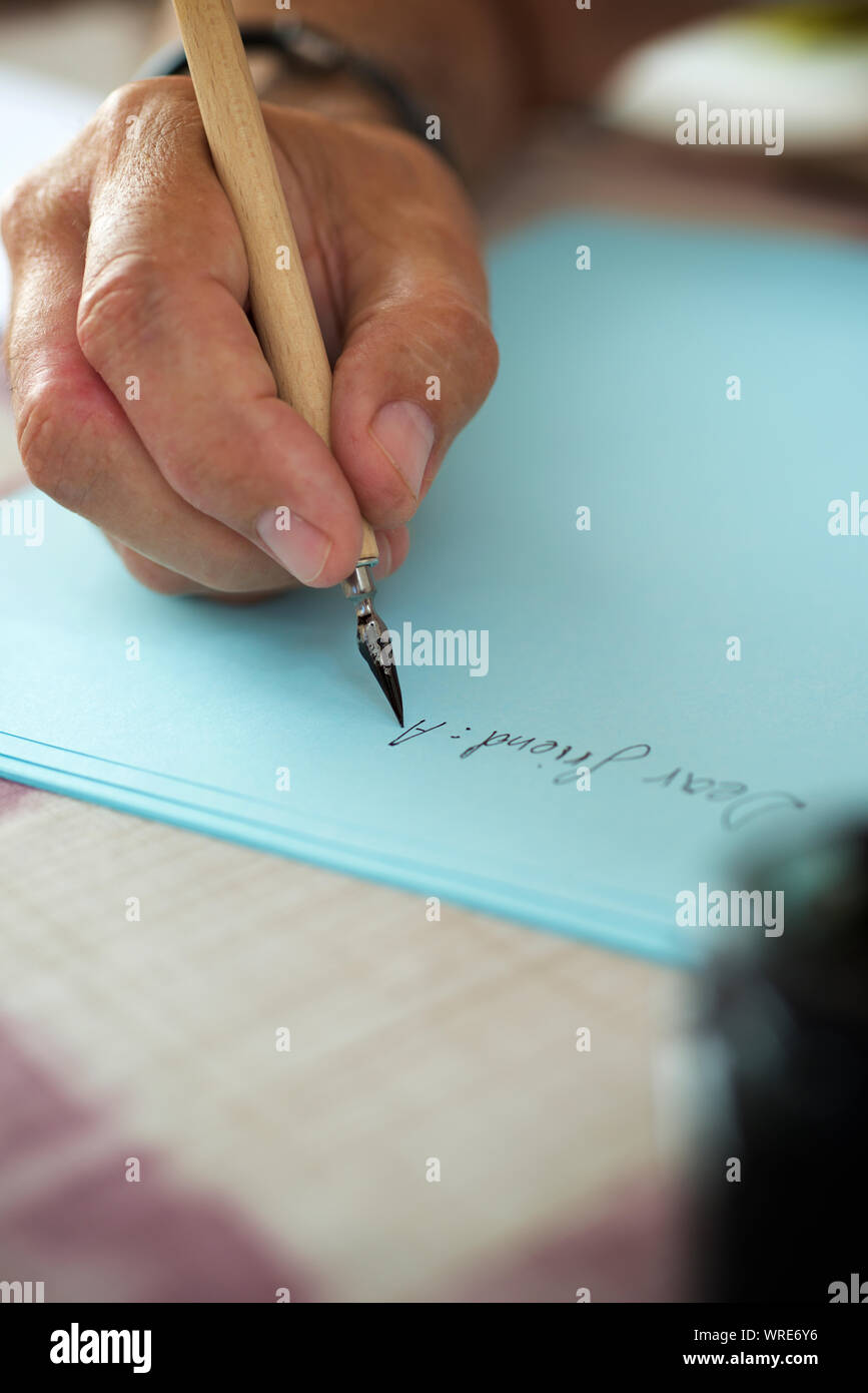 Senior man writing a letter to a friend Stock Photo - Alamy