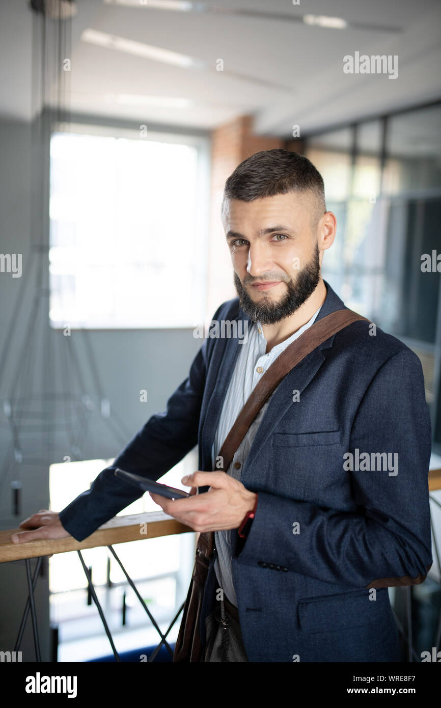 Office worker enjoying little break and texting girlfriend Stock Photo ...