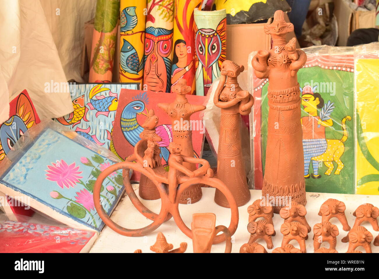 clay made miniature of different animals like elephant duck and dolls ...