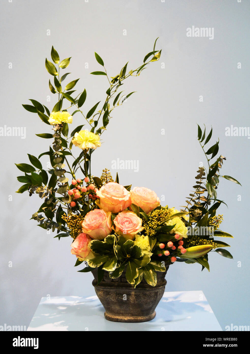 Beautiful professional floral arrangement of roses and branches Stock ...