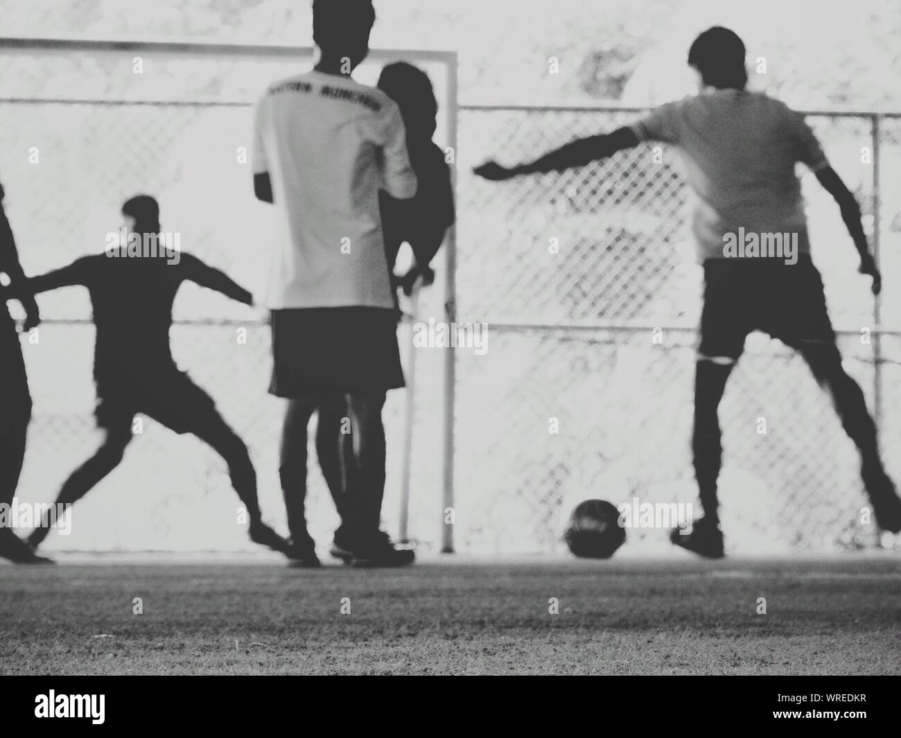 Friends playing soccer hi-res stock photography and images - Alamy