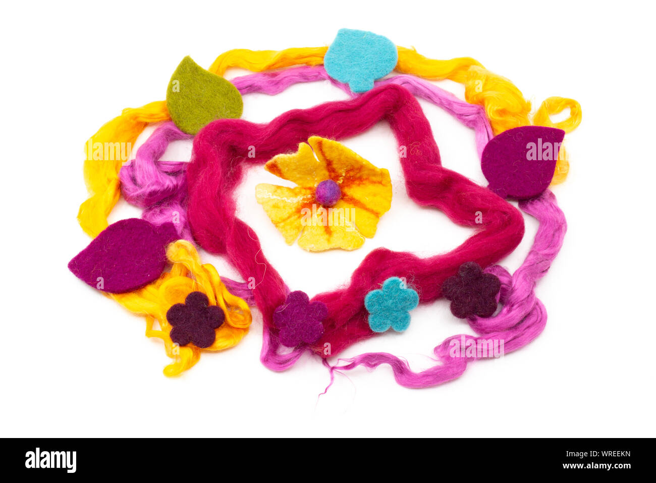 Group of colorful felt objects isolated on white Stock Photo - Alamy