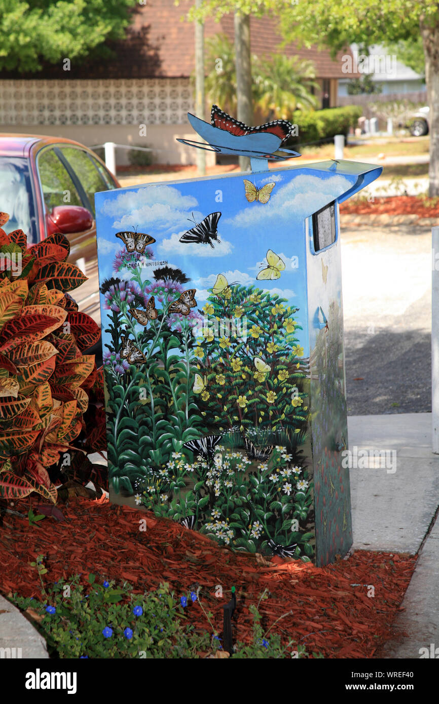 Trash containers with creative design in Town of Murals, Lake Placid in ...