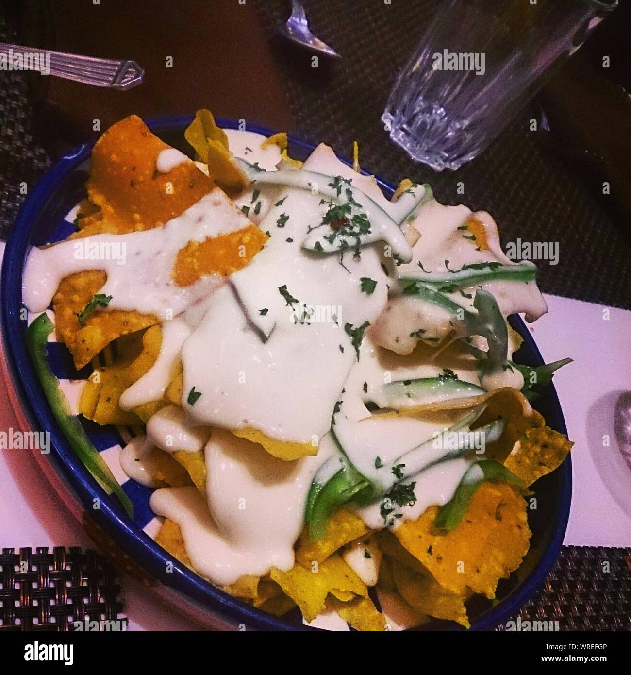Nachos with cheese hi-res stock photography and images - Alamy