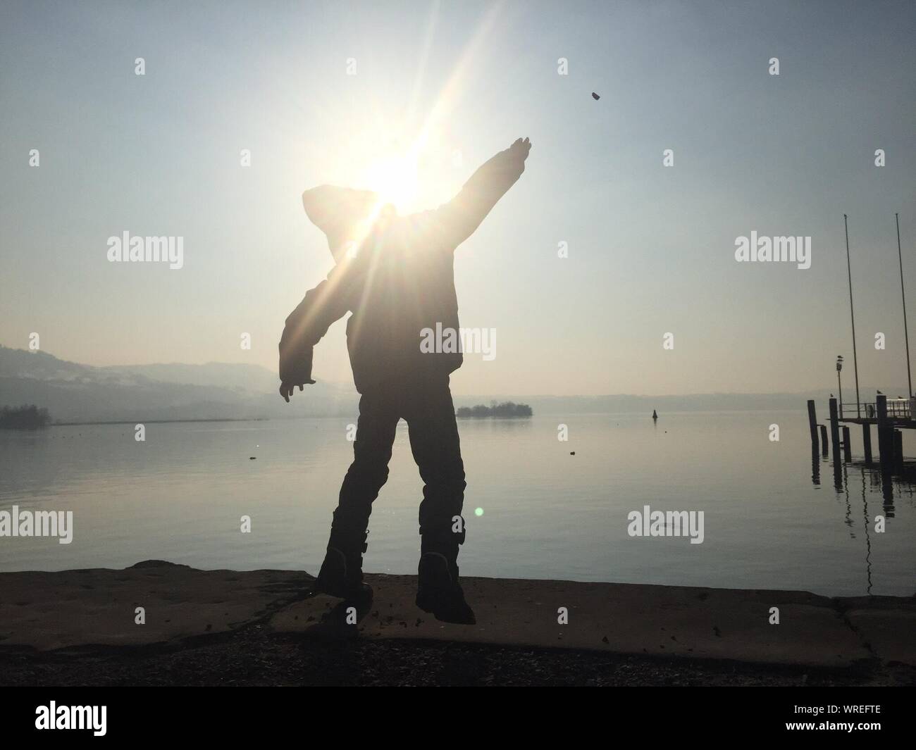 Throwing stone in water hi-res stock photography and images - Alamy