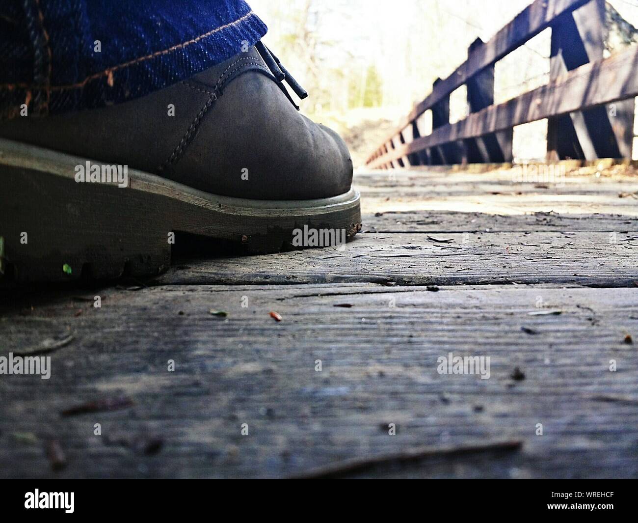 Person crossing footbridge hi-res stock photography and images - Alamy
