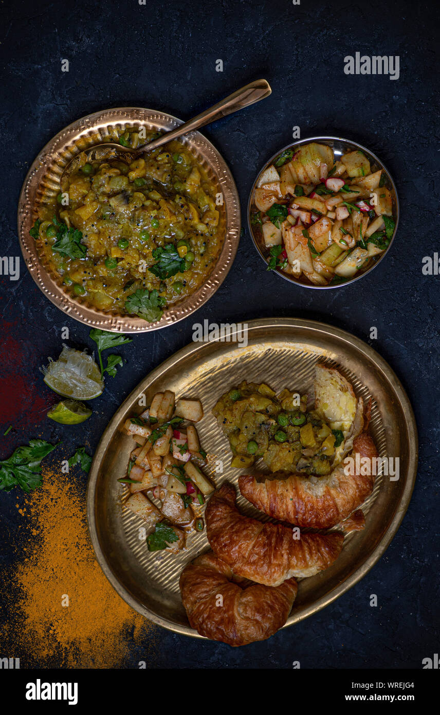 Indian Pao Bhaji- Potato Curry and Flaky Croissant Stock Photo - Alamy