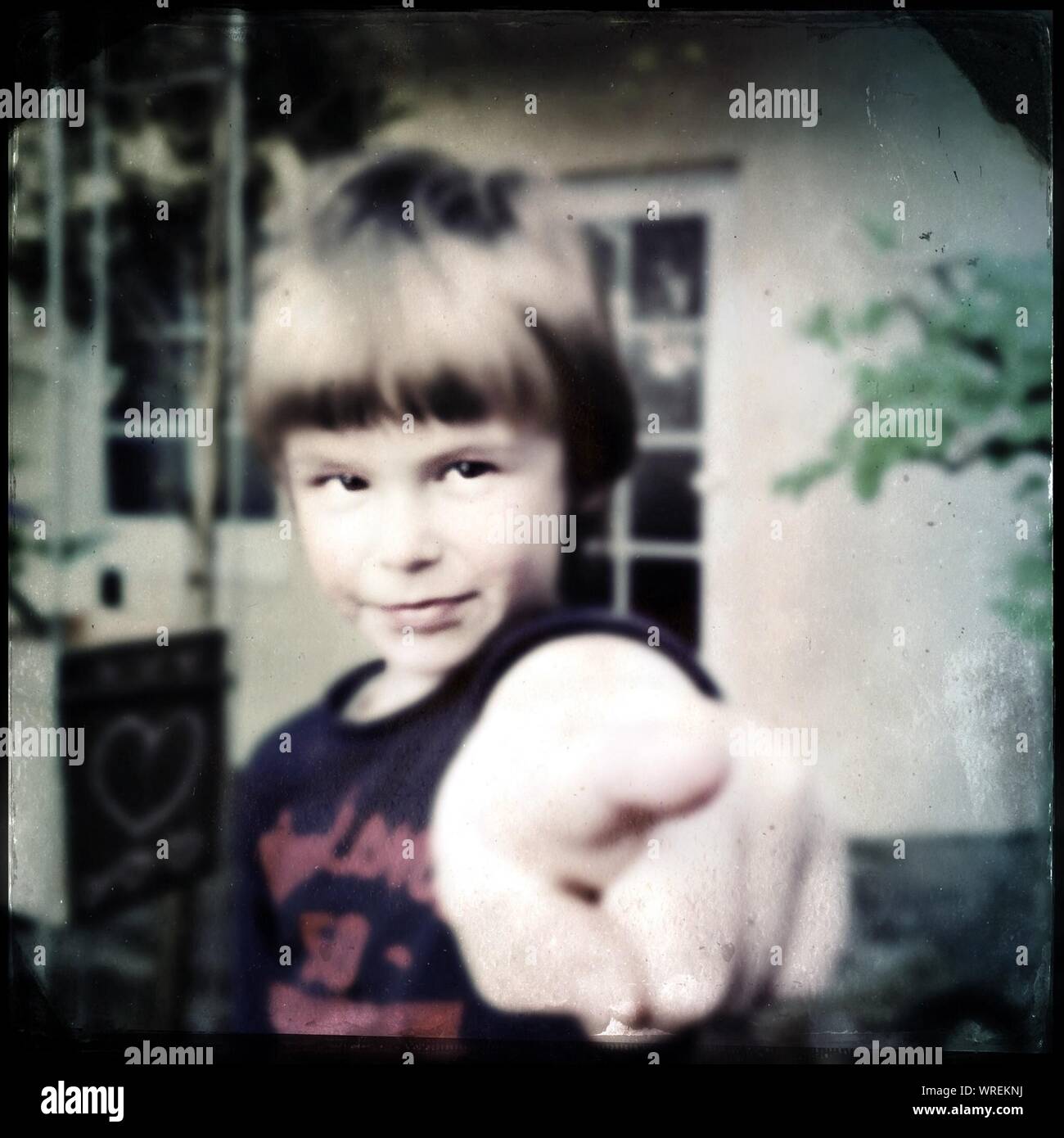 Boy pointing hi-res stock photography and images - Alamy