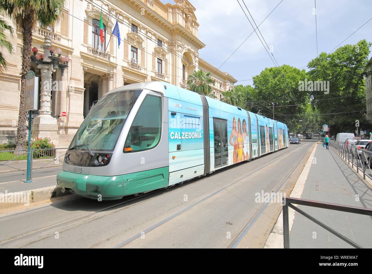 Tram train run through downtown Rome Italy Stock Photo - Alamy