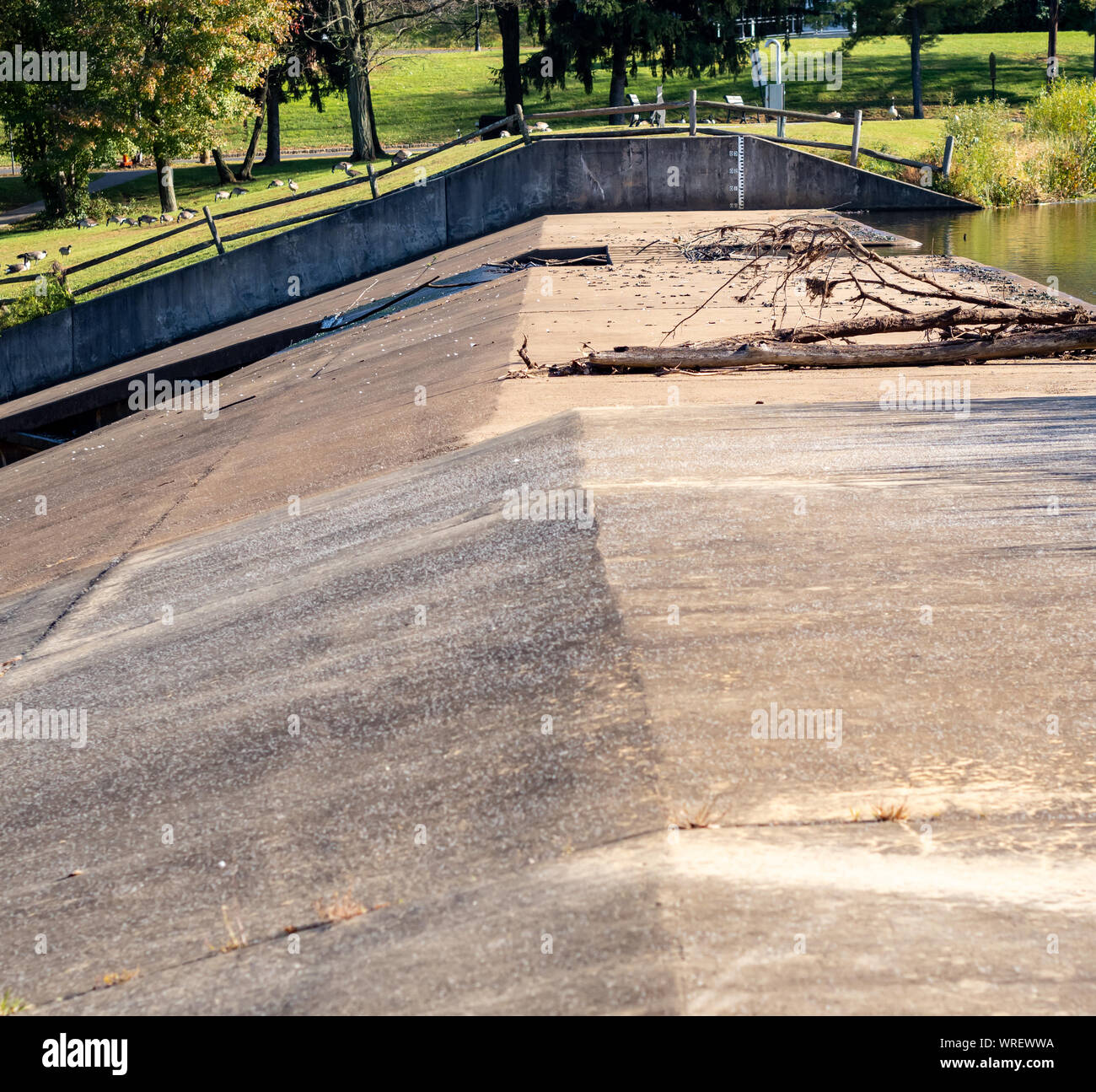 close-view of a small river dam in the park in the fall Stock Photo - Alamy