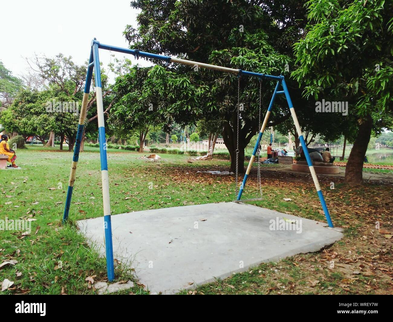 Park playground swing hi-res stock photography and images - Alamy